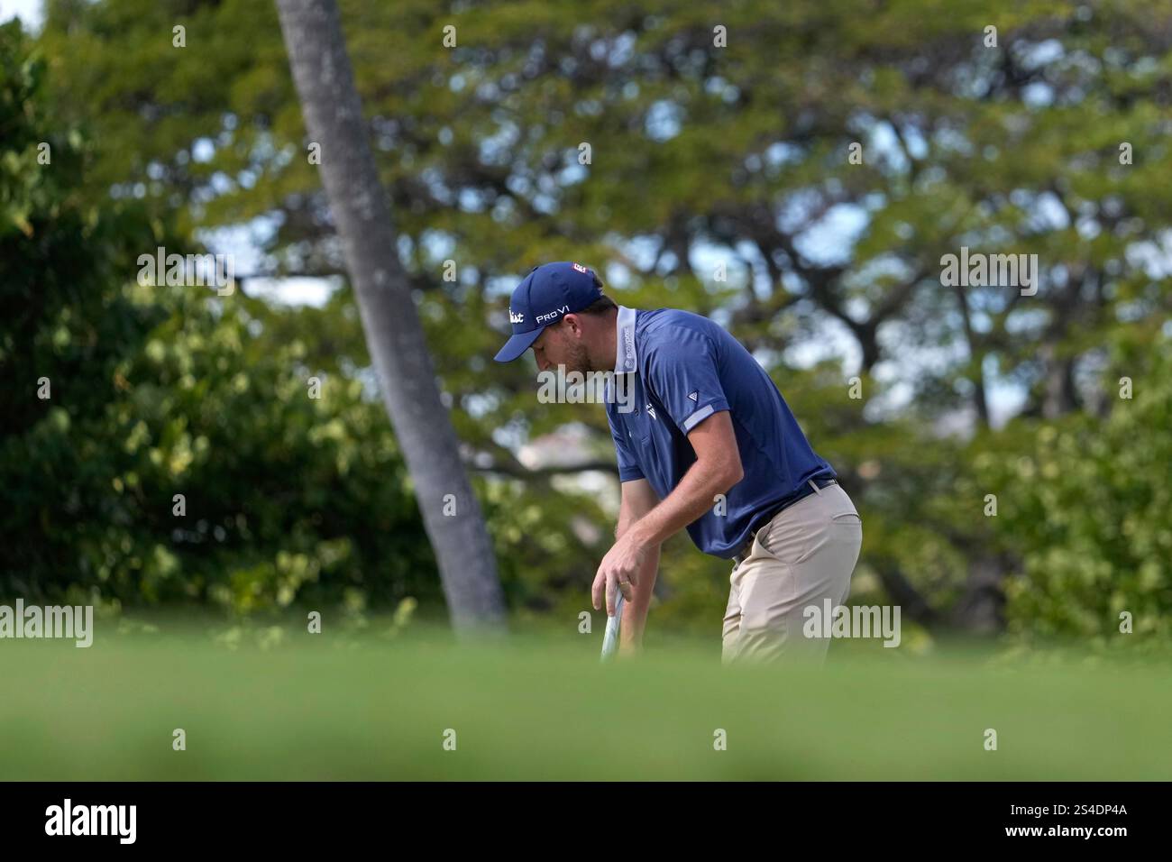 Lee Hodges reacts after missing birdie putt on the 13th green during ...