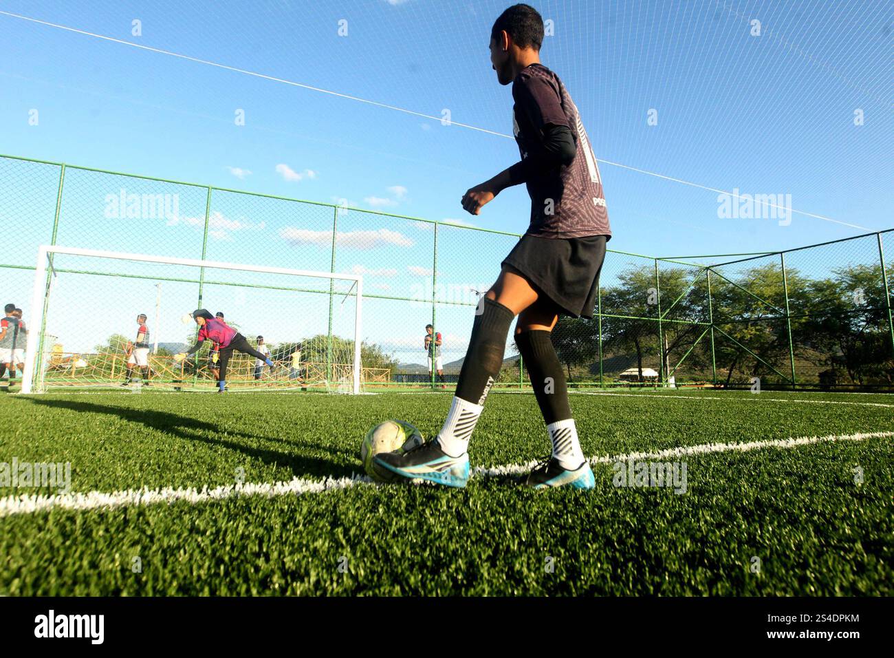 grass on soccer field jequie, bahia, brazil - may 20, 2023: Young ...