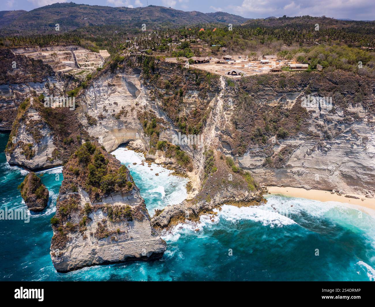 Tropical ocean waves crashing into a small beach and spectacular ...