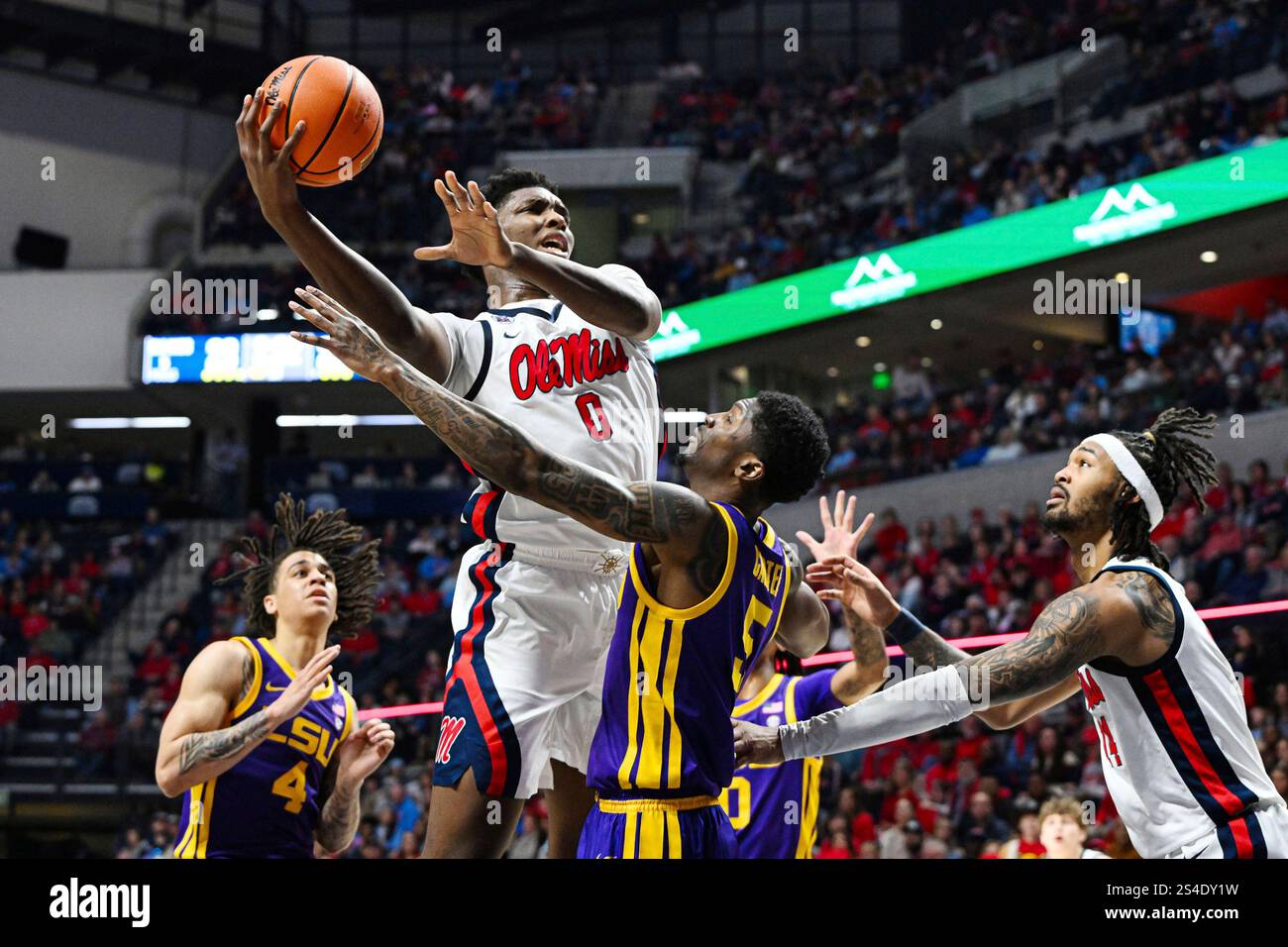 Mississippi forward Malik Dia (0) goes up to shoot over LSU guard Cam ...