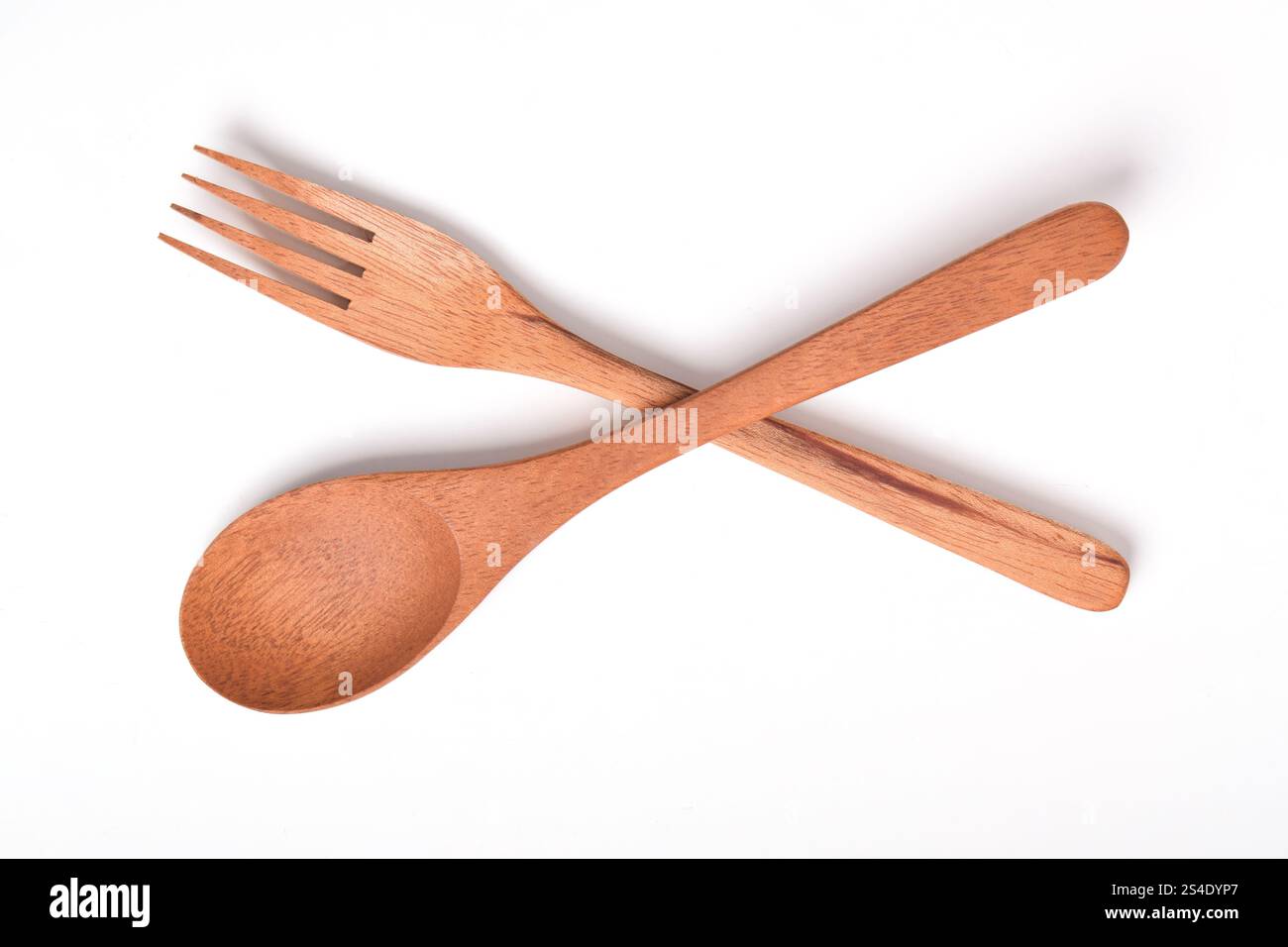 Wooden spoon and fork, crossed as road sign, isolated on white background. Houseware Stock Photo ...