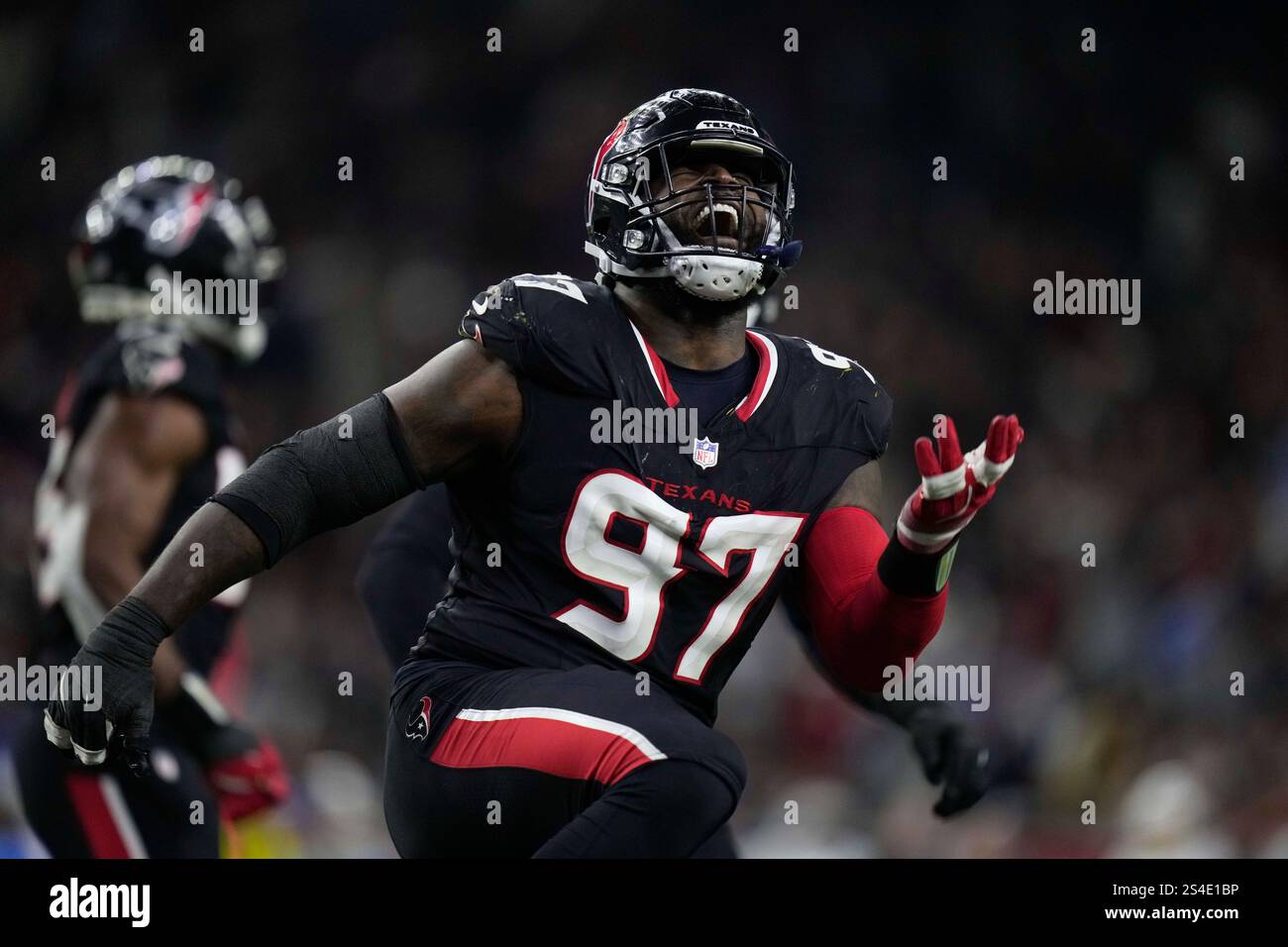 Houston Texans defensive tackle Mario Edwards Jr. (97) celebrates after ...