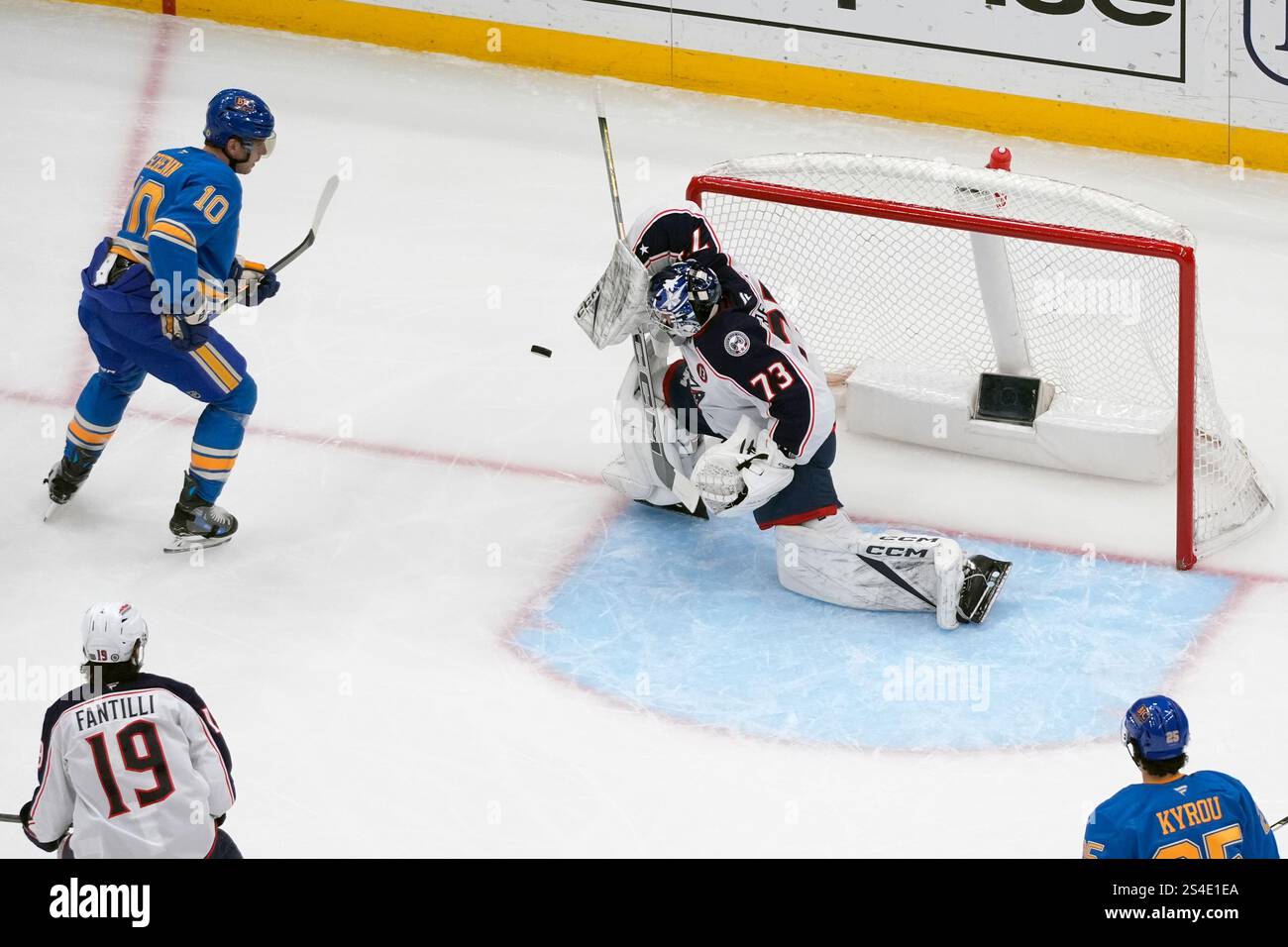 Columbus Blue Jackets goaltender Jet Greaves (73) deflects a puck as St ...