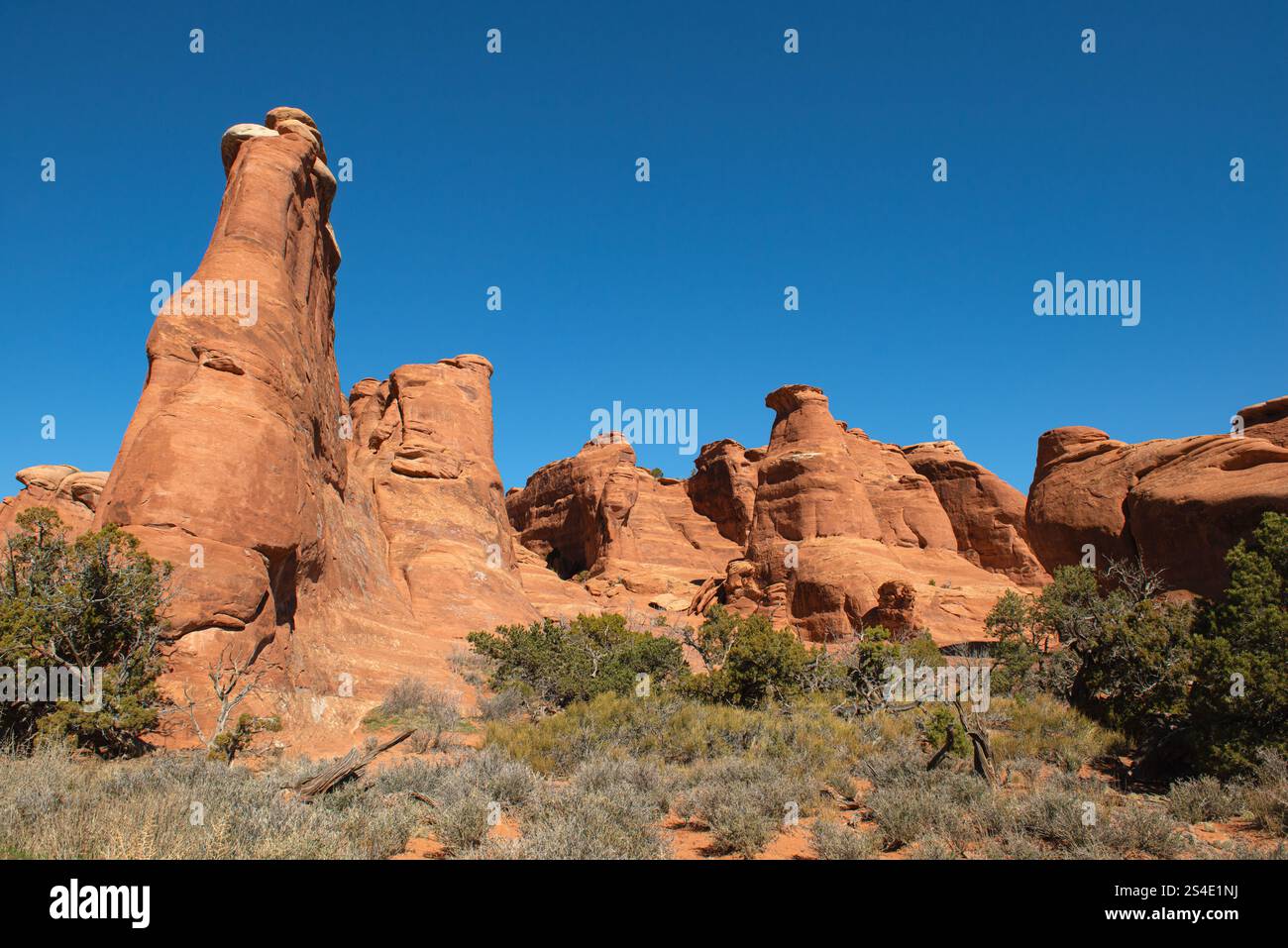 Red rock formation along footpath to Broken Arch in Arches National ...