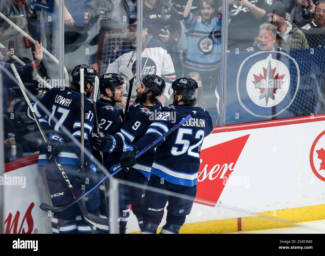 Winnipeg Jets' Adam Lowry (17), Nikolaj Ehlers (27), Alex Iafallo (9 ...