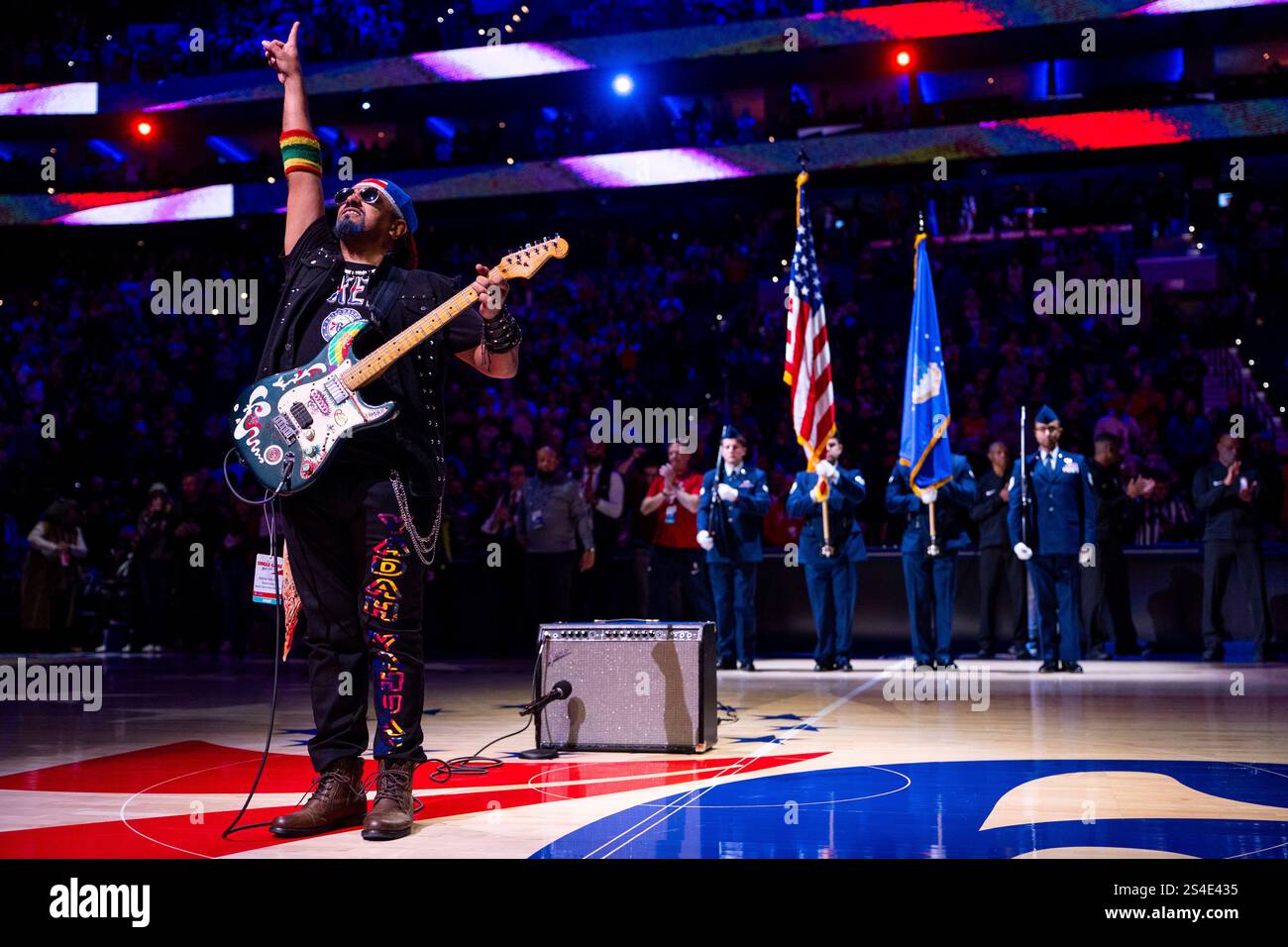 Musician Gabriele Guma performs the National Anthem prior to the NBA ...