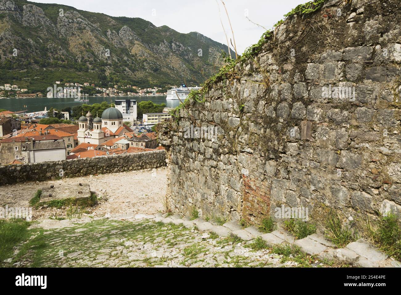 High angle view of walled mountainside walking trail and old stone wall ...