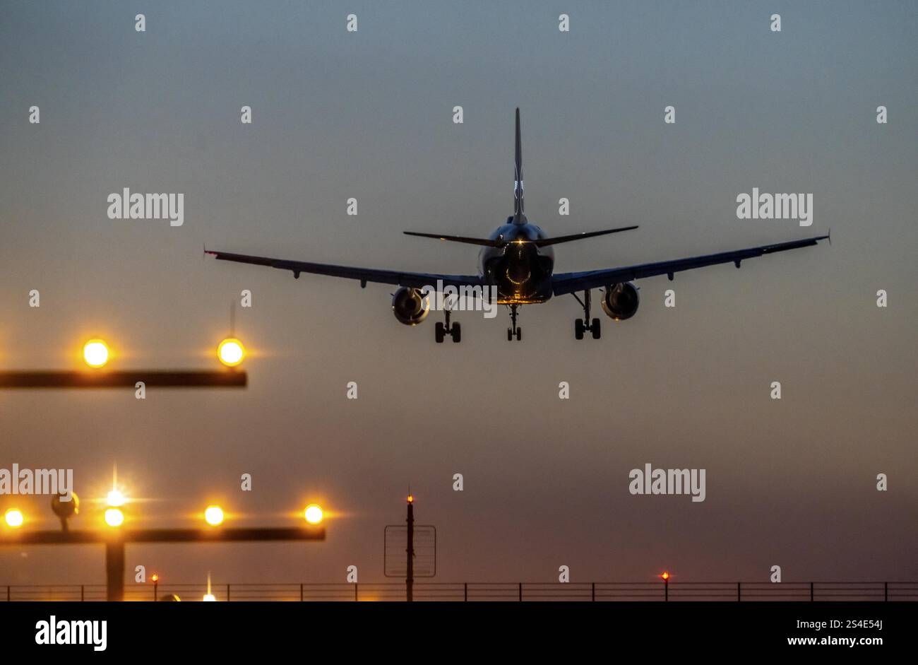 Aircraft approaching the main runway south, 05R/23L, runway lighting ...