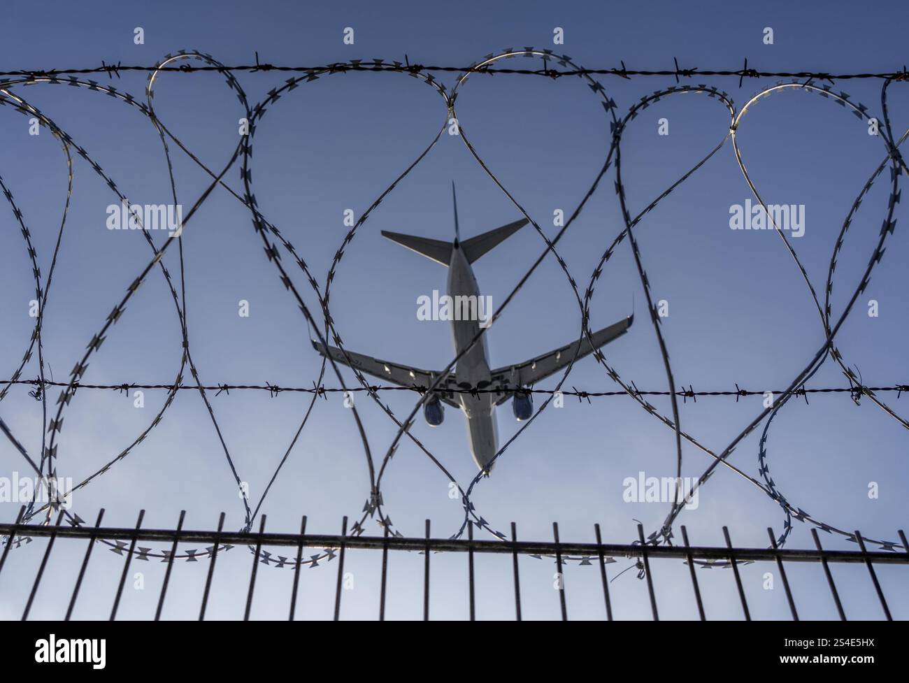 Symbolic image security at the airport, outer fence at Duesseldorf ...