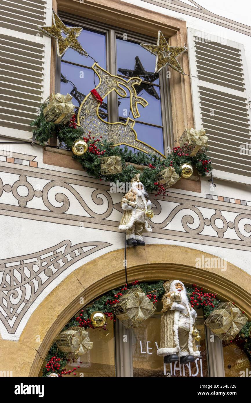 Detail of a shop facade decorated for Christmas with many Father ...