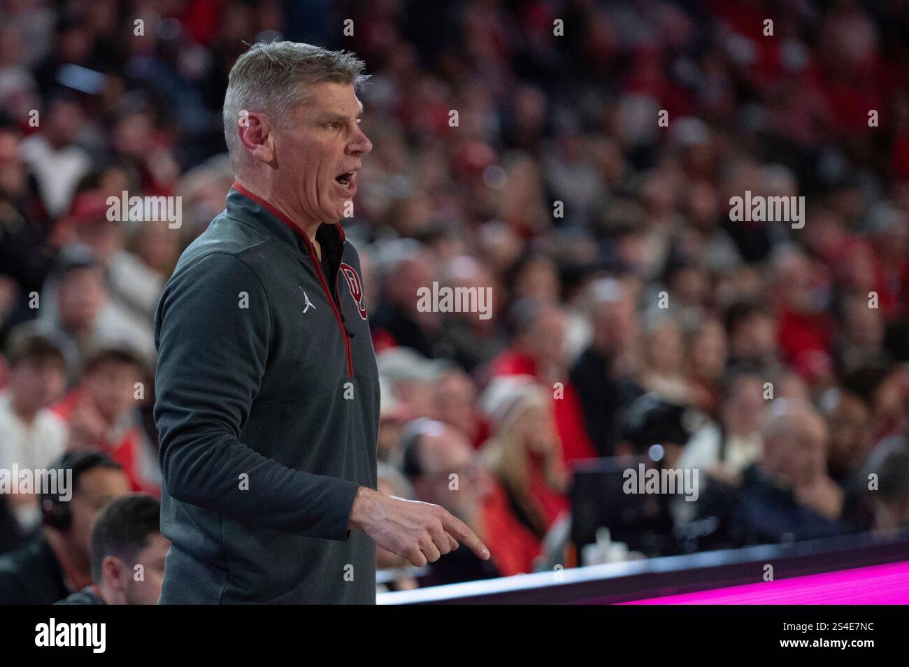 Oklahoma head coach Porter Moser yells to his team during the first ...