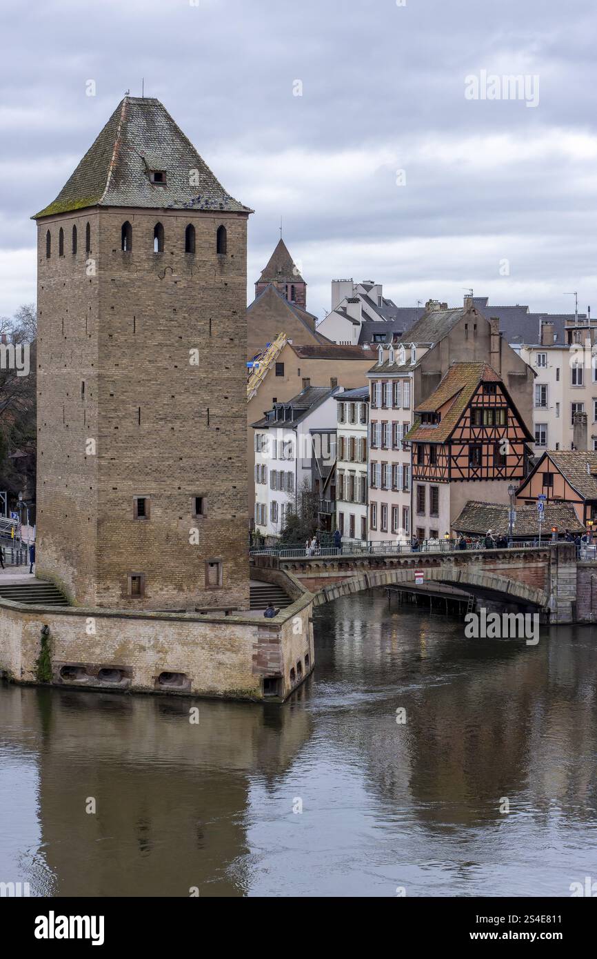 A tower with medieval bridge Ponts Couverts de Strasbourg over the ...