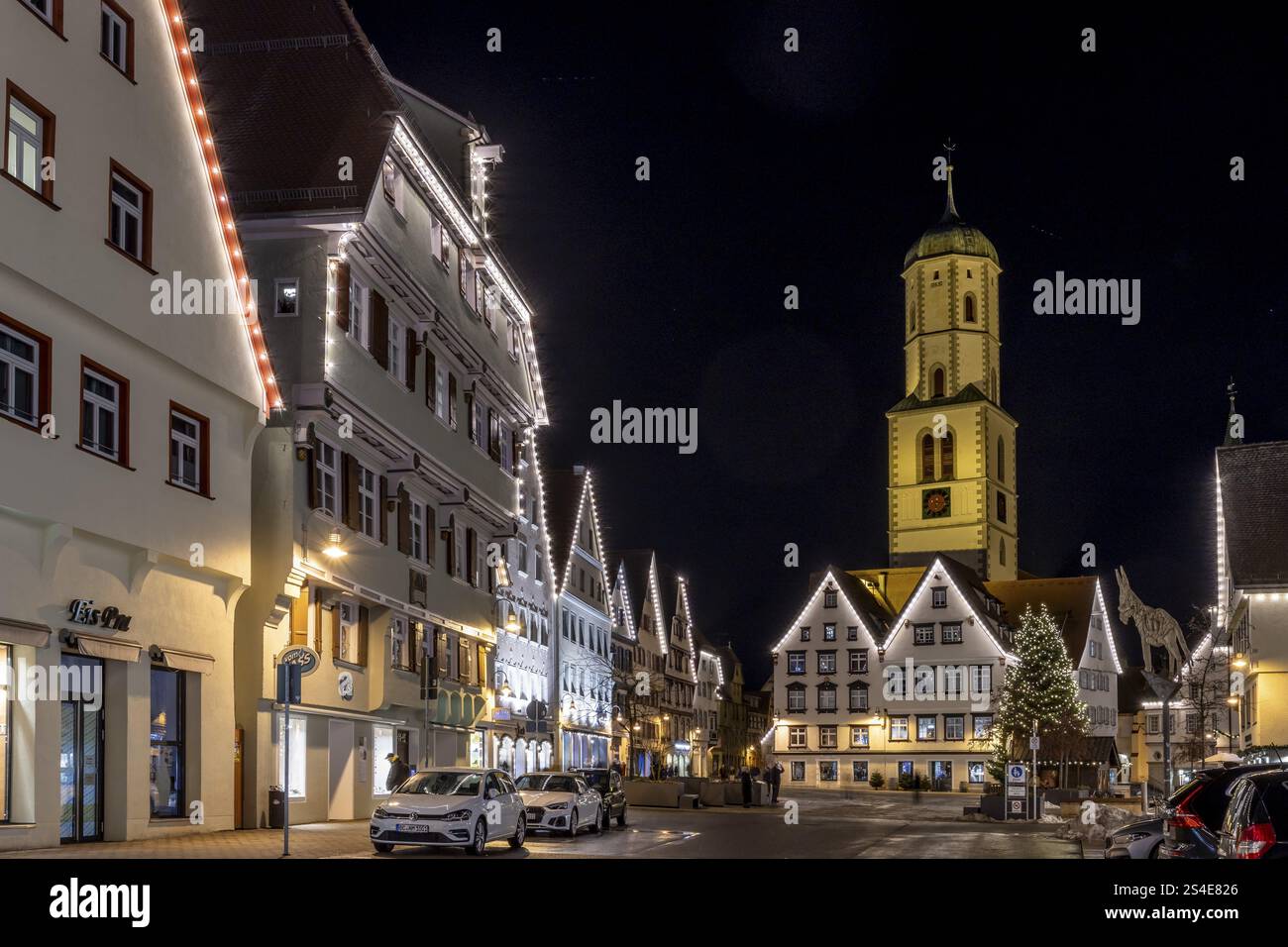 Night photo of historic buildings around the market square with ...