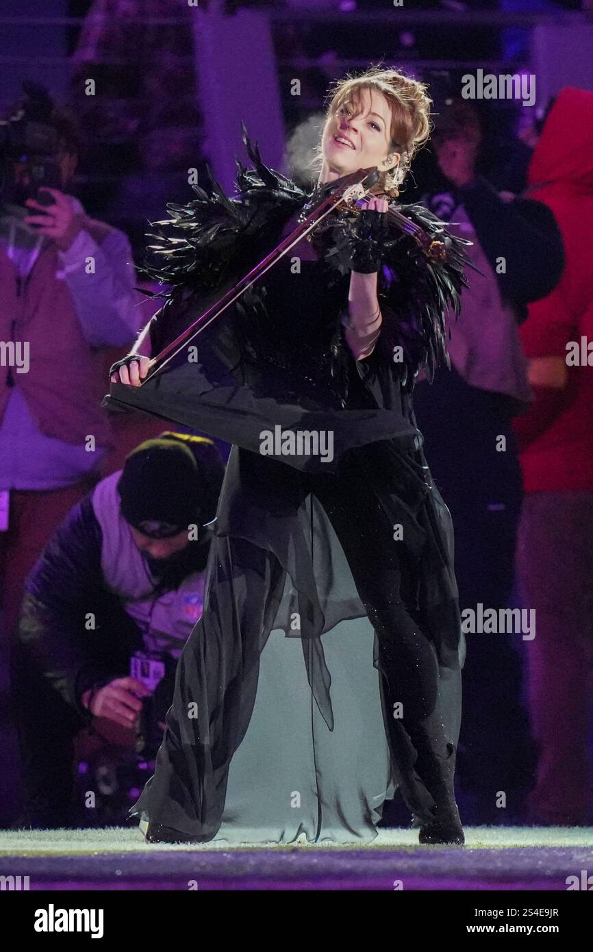Violinist Lindsey Stirling performs during the first half of an NFL ...
