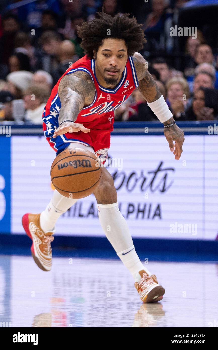 Philadelphia 76ers' Kelly Oubre Jr. reaches for the ball during the NBA ...