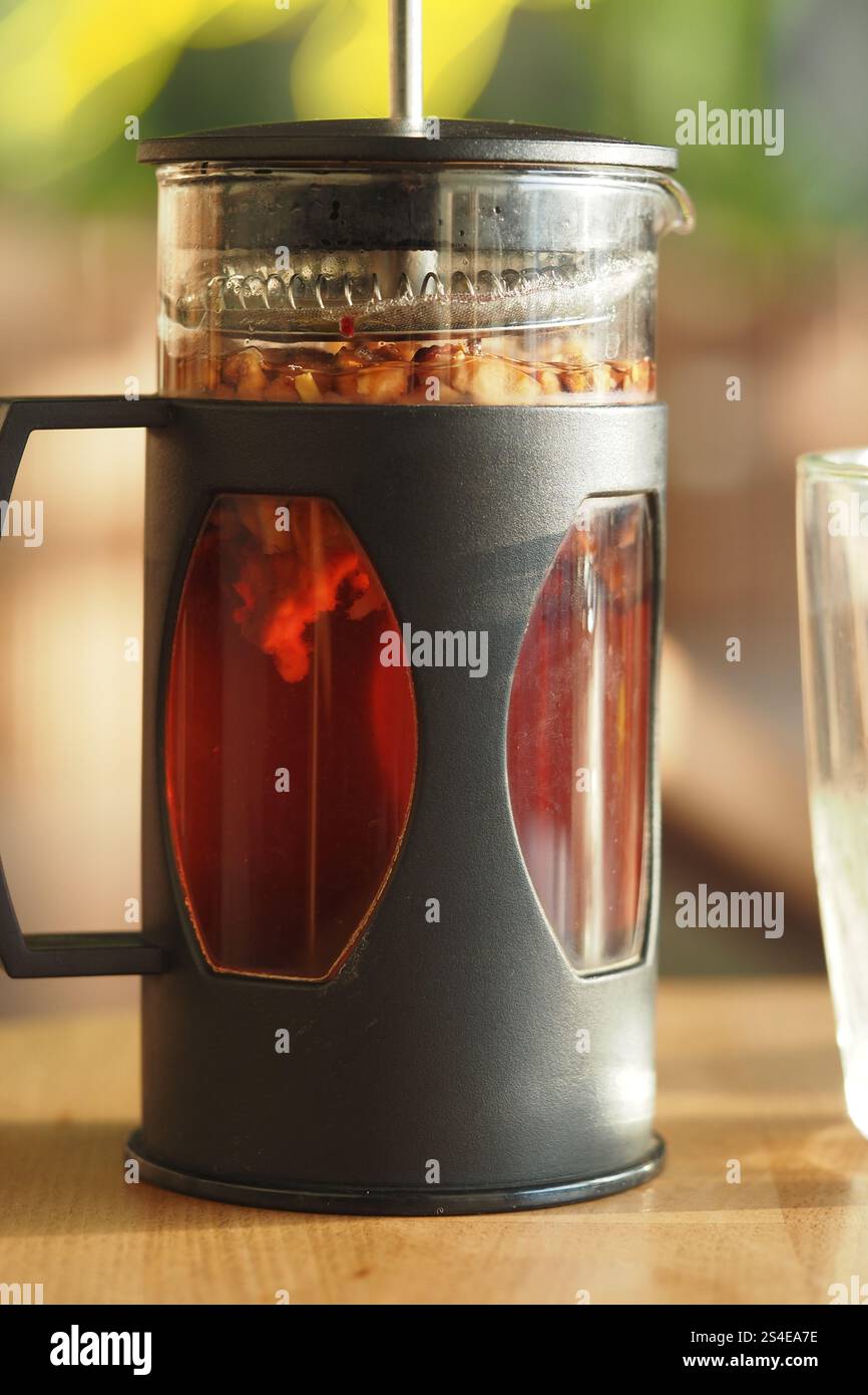 Preparation of Herbal Tea with Lemon Using a French Press Device Stock ...