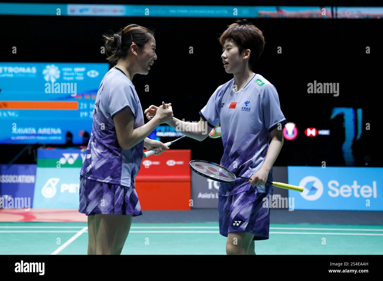 Jia Yi Fan (L) and Zhang Shu Xian of China celebrate victory against ...