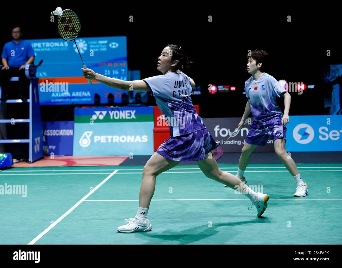 Jia Yi Fan (L) and Zhang Shu Xian of China play against Liu Sheng Shu and Tan Ning of China (not ...