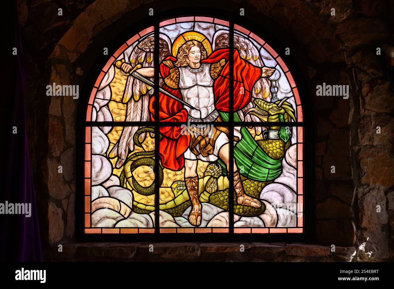 Saint Michael the Archangel. A stained-glass window in the Oasis of Peace community chapel in ...