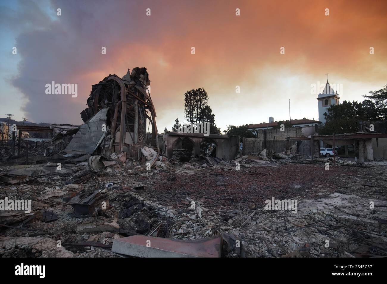 Houses are reduced to ashes due to the fire in Pacific Palisades. In ...