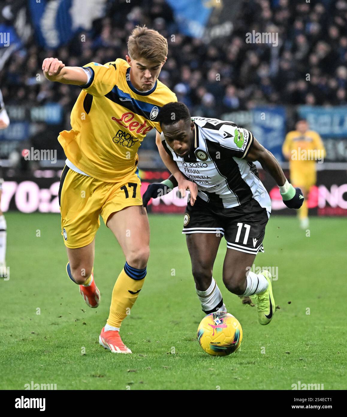 Udine, Italy. 11th Jan, 2025. Atalanta's Charles De Katelaere (L) vies ...