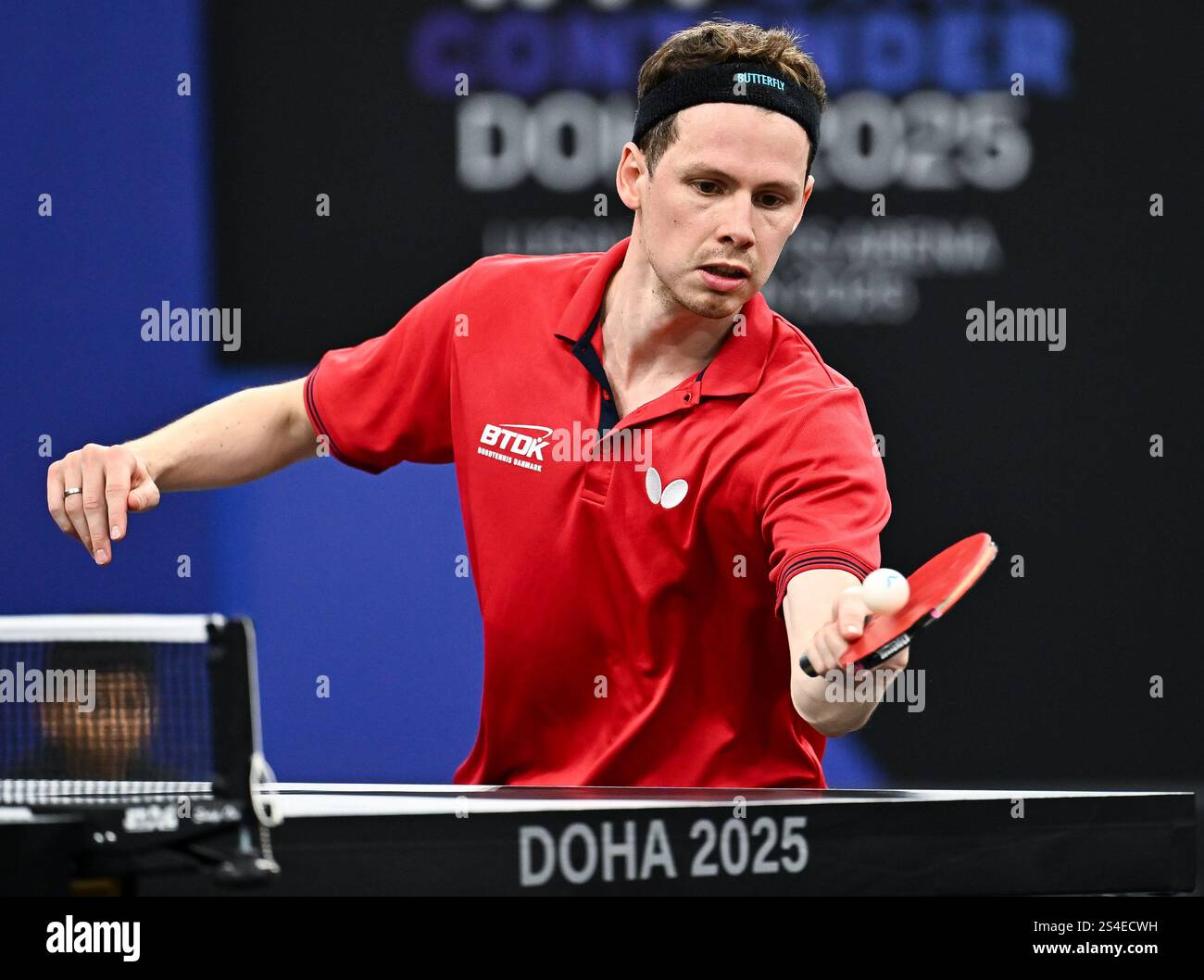 Doha, Qatar. 11th Jan, 2025. Jonathan Groth hits a return during the ...