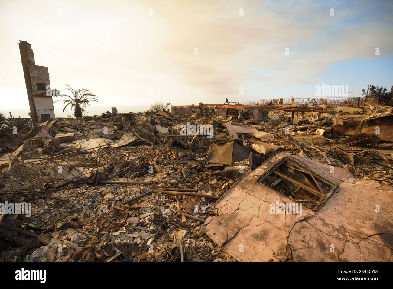 Houses are reduced to ashes due to the fire in Pacific Palisades. In ...