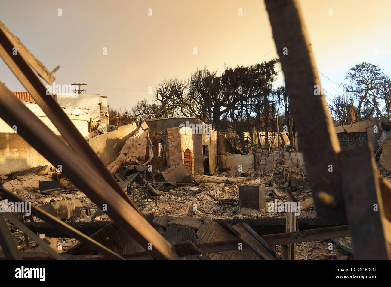 Houses are reduced to ashes due to the fire in Pacific Palisades. In the aftermath of the ...