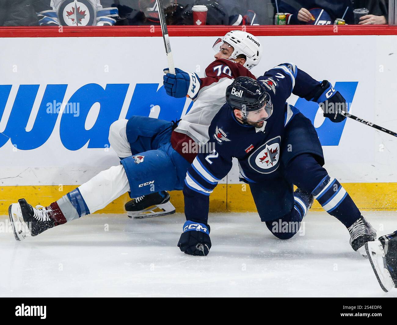 Winnipeg Jets' Dylan DeMelo (2) defends against Colorado Avalanche's ...