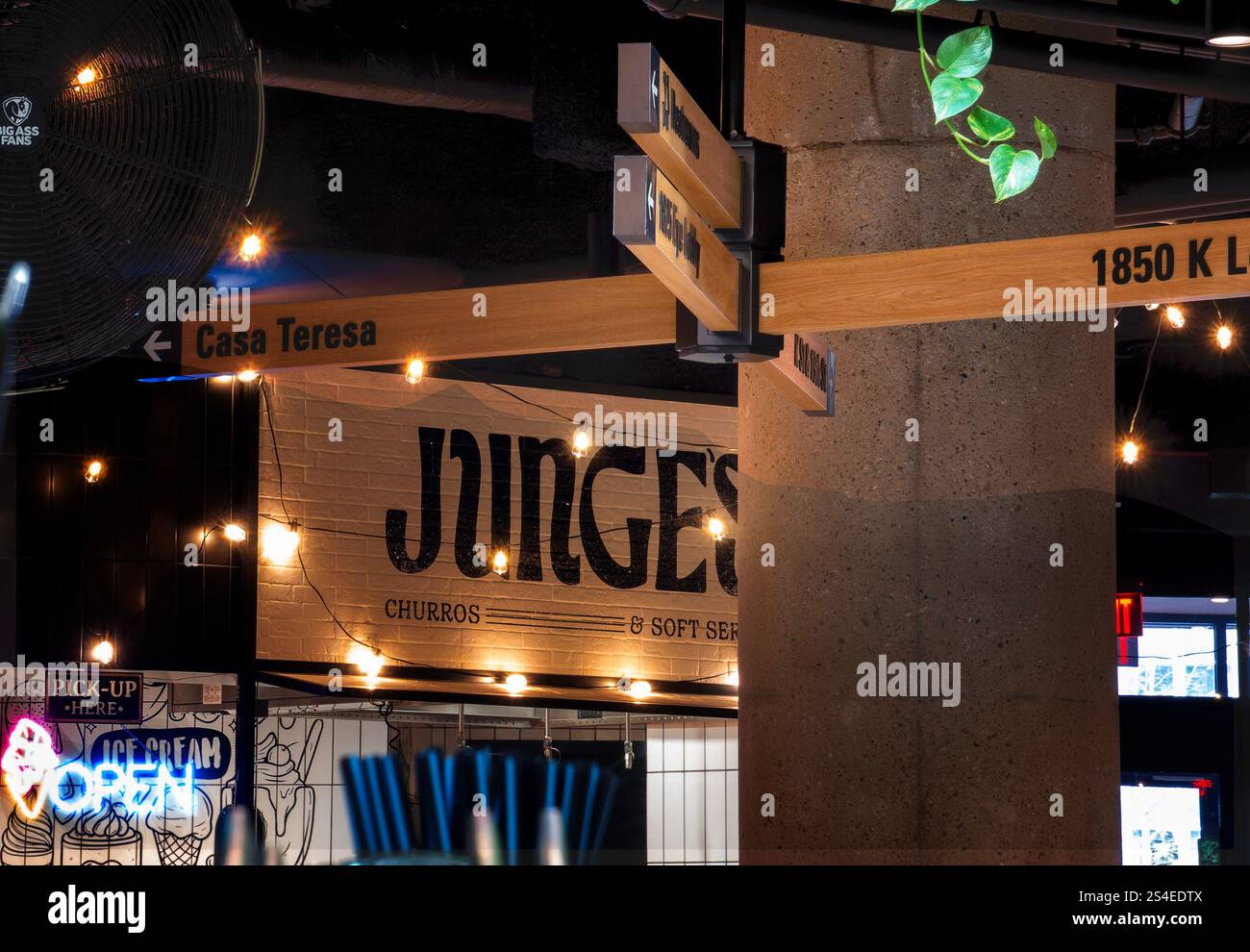 Restaurant signage in an office building atrium Stock Photo - Alamy