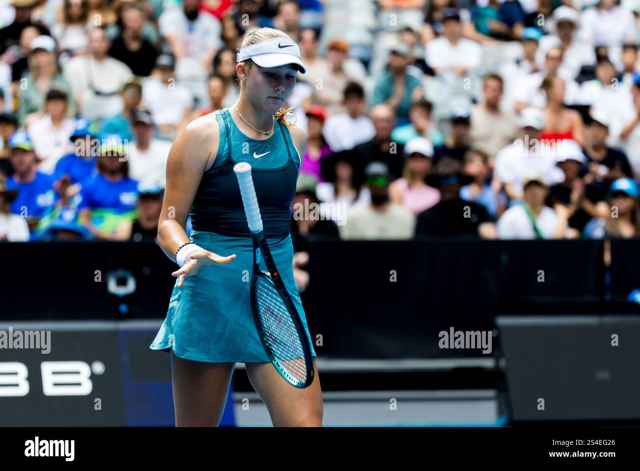 MELBOURNE, VIC - JANUARY 12: Mirra Andreeva of Russia throws her ...