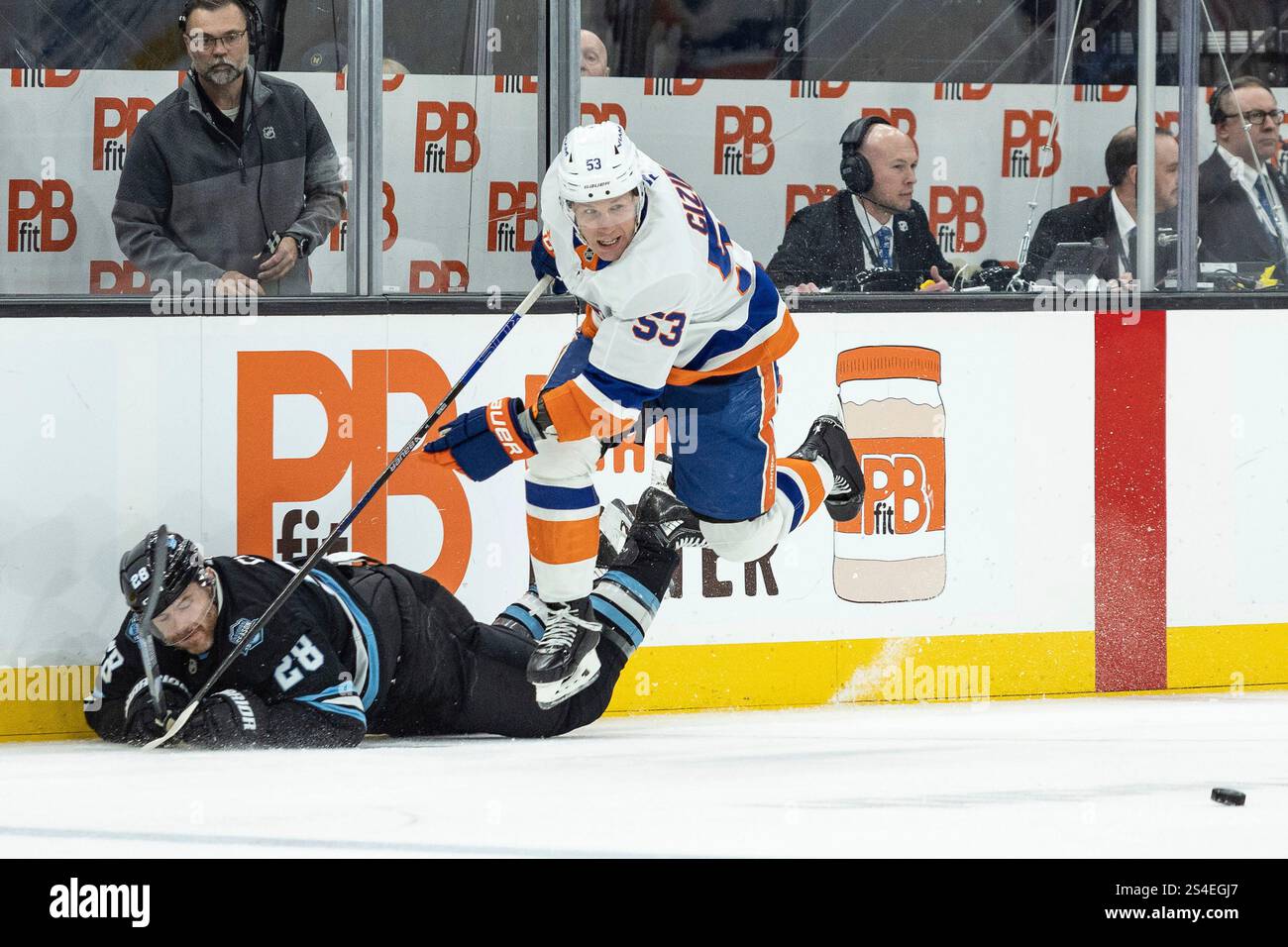 Utah Hockey Club defenseman Ian Cole (28) goes down fighting for the ...