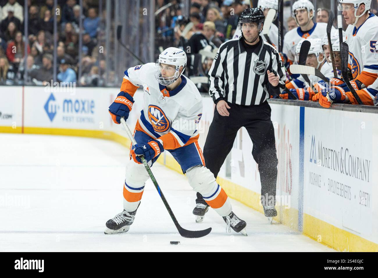 New York Islanders defenseman Adam Pelech (3) moves the puck on the ice ...