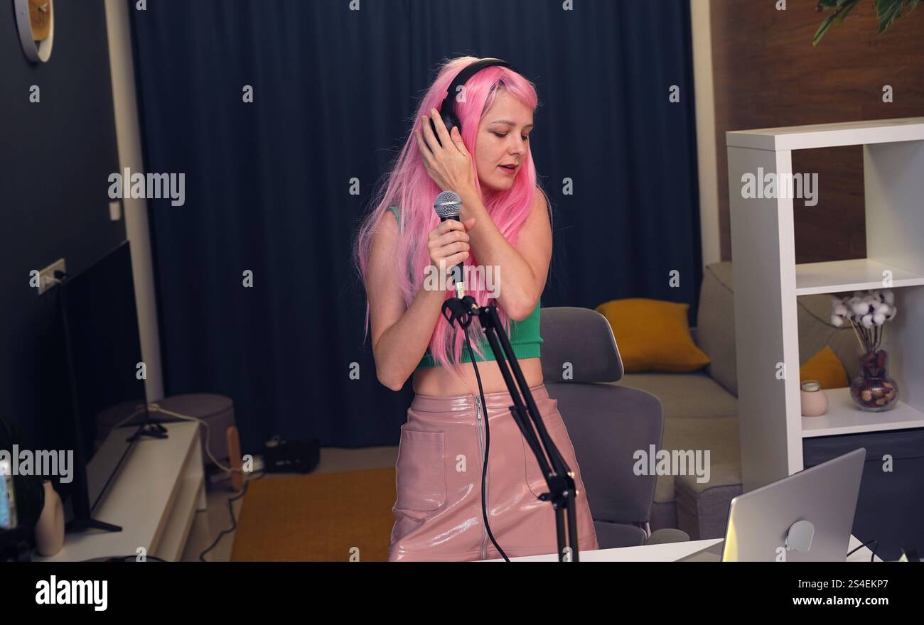 Beautiful young singer and musician broadcast from her home studio ...