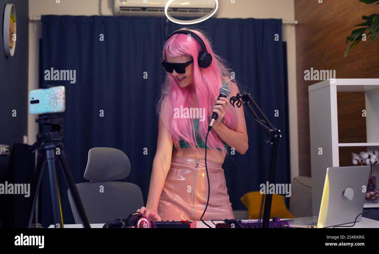 Beautiful young singer and musician broadcast from her home studio ...