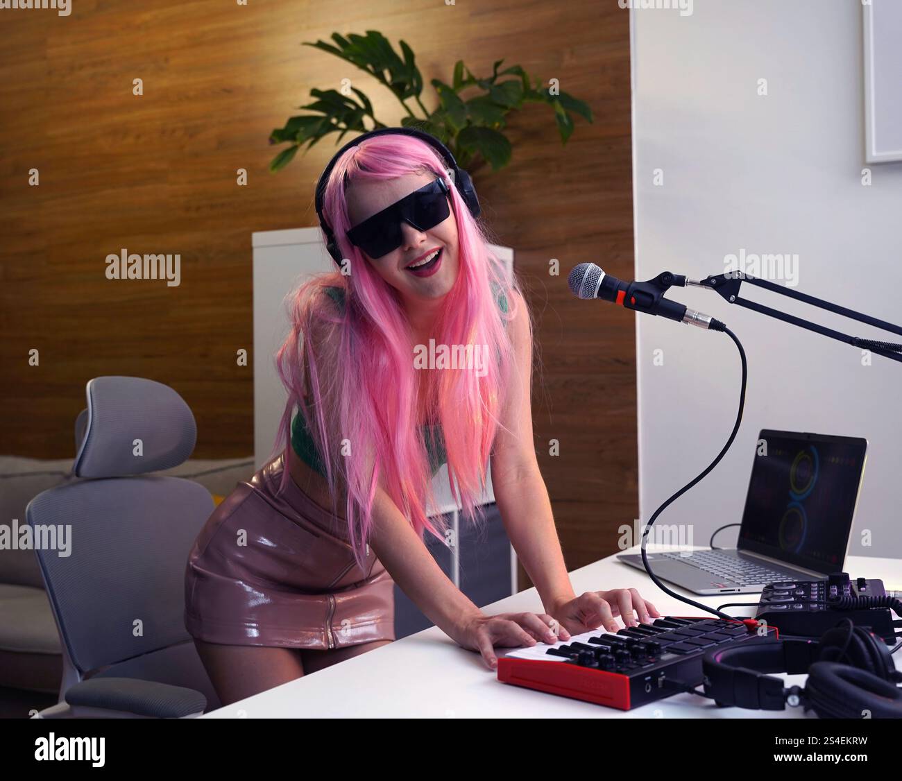 Beautiful young singer and musician broadcast from her home studio ...