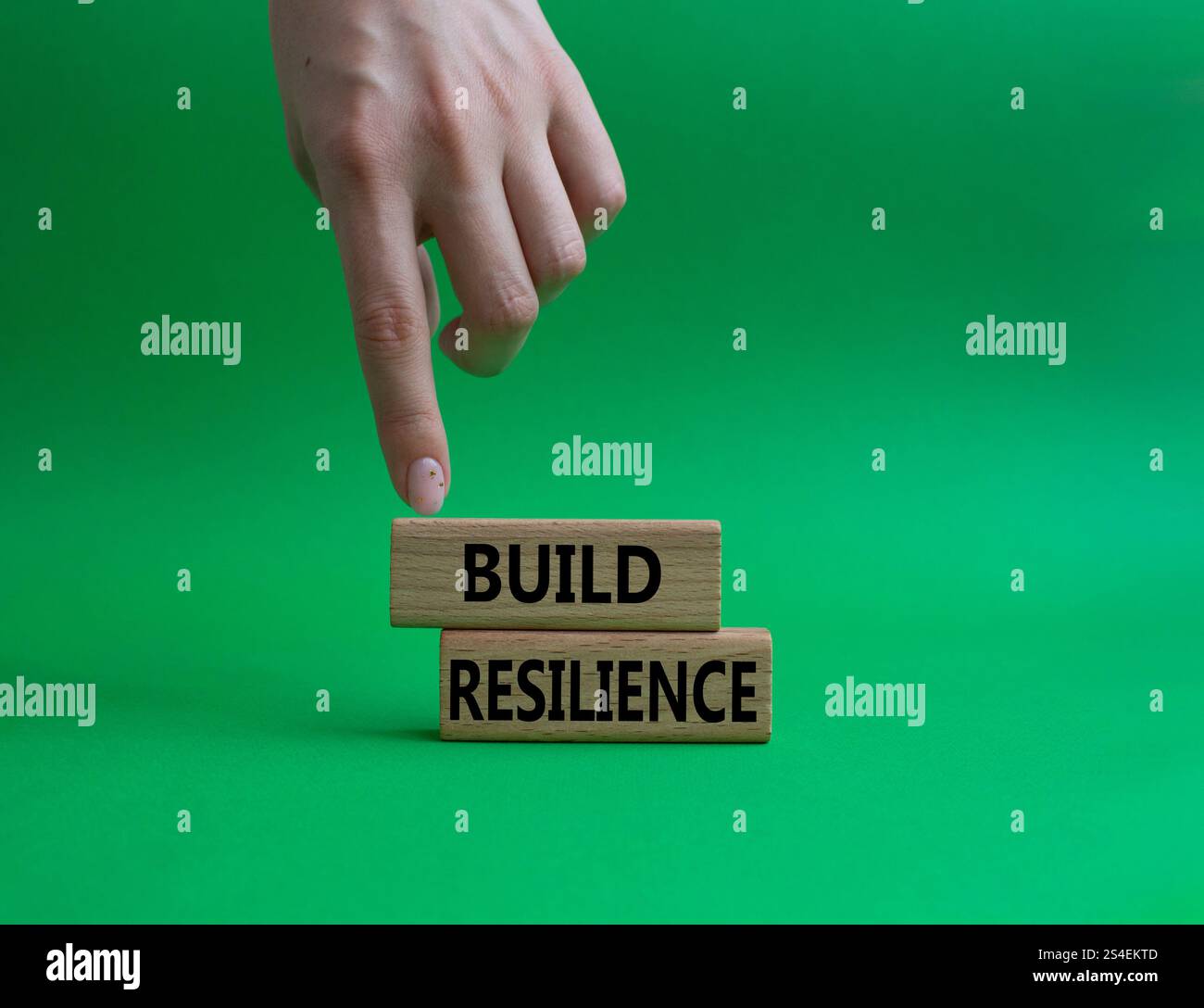 Build resilience symbol. Wooden blocks with words Build resilience ...