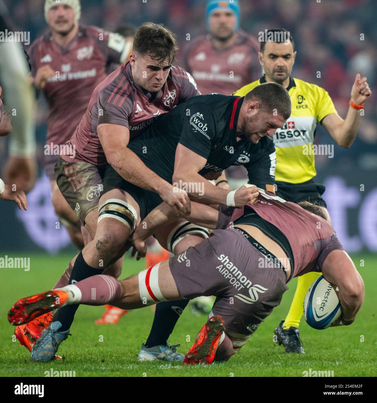Limerick, Ireland. 12th Jan, 2025. Gavin Coombes of Munster tackled by ...