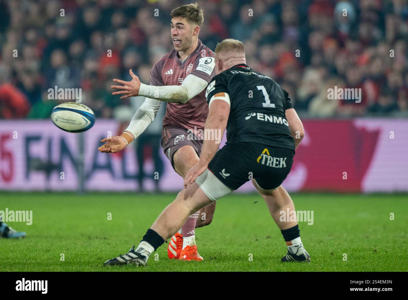 Limerick, Ireland. 12th Jan, 2025. Jack Crowley of Munster passes the ...