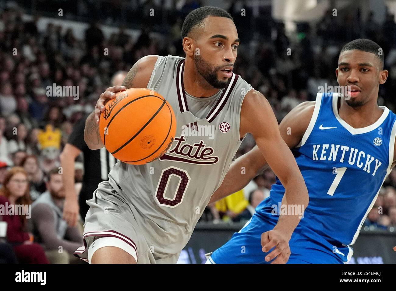 Mississippi State guard Claudell Harris Jr. (0) dribbles past Kentucky ...
