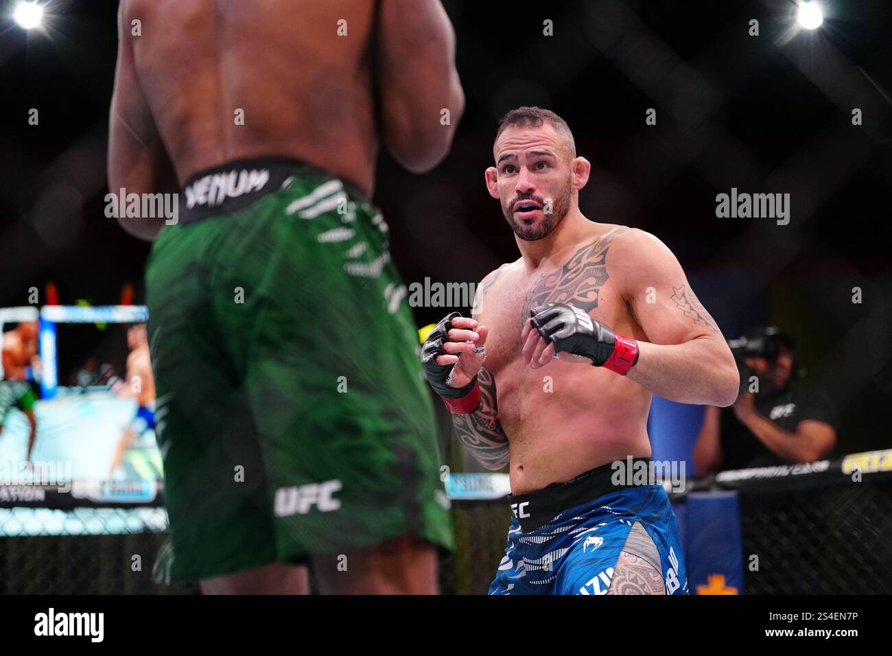LAS VEGAS, NV - JANUARY 11: Santiago Ponzinibbio and Carlston Harris ...