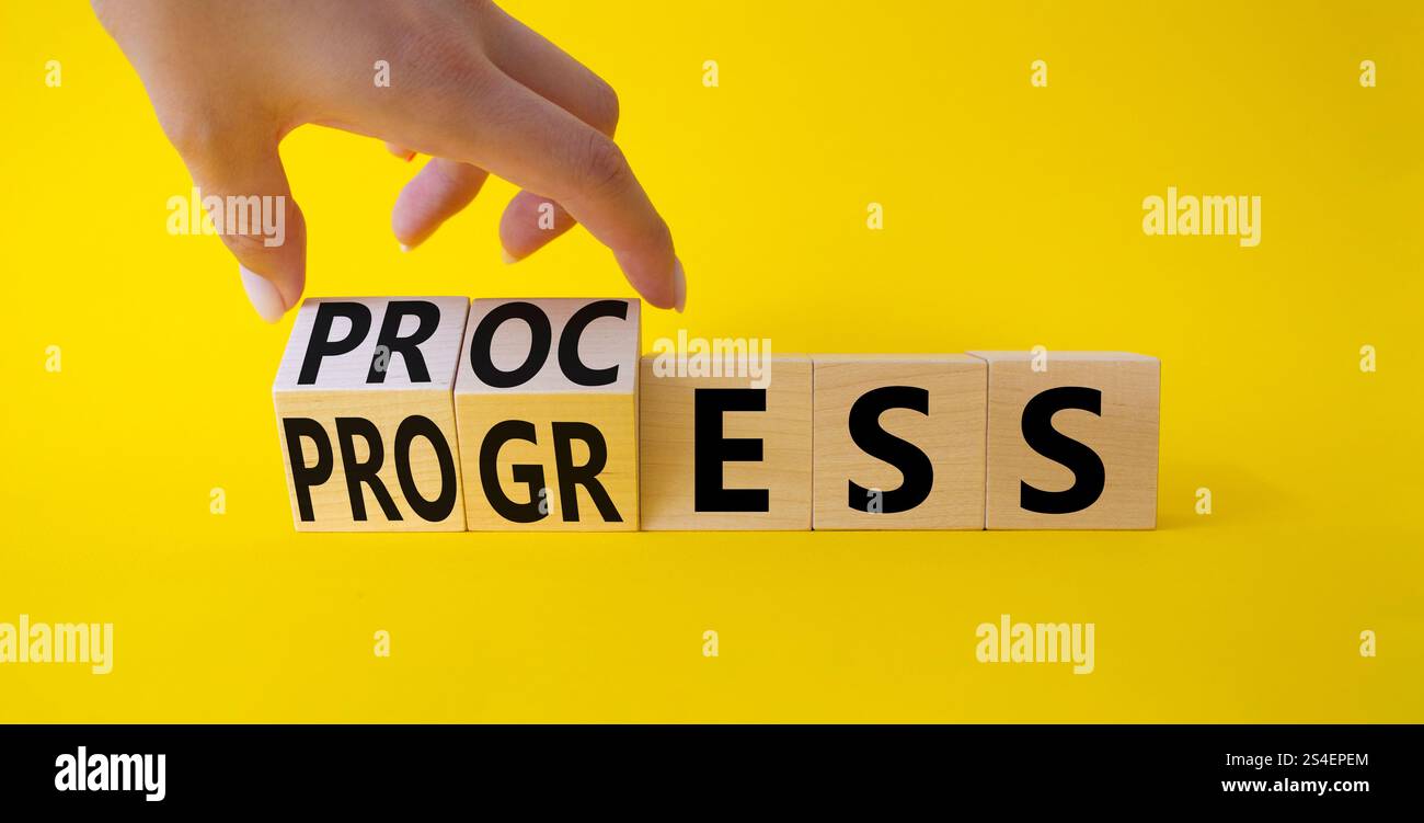 Process and Progress symbol. Hand turns wooden cubes and changes word ...