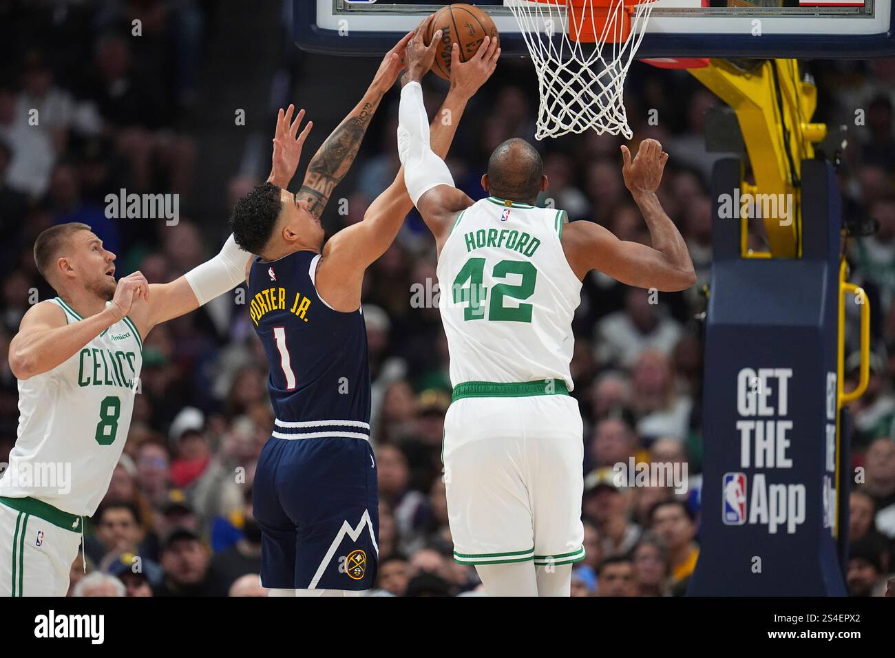 Denver Nuggets forward Michael Porter Jr. (1) drives to the basket as ...