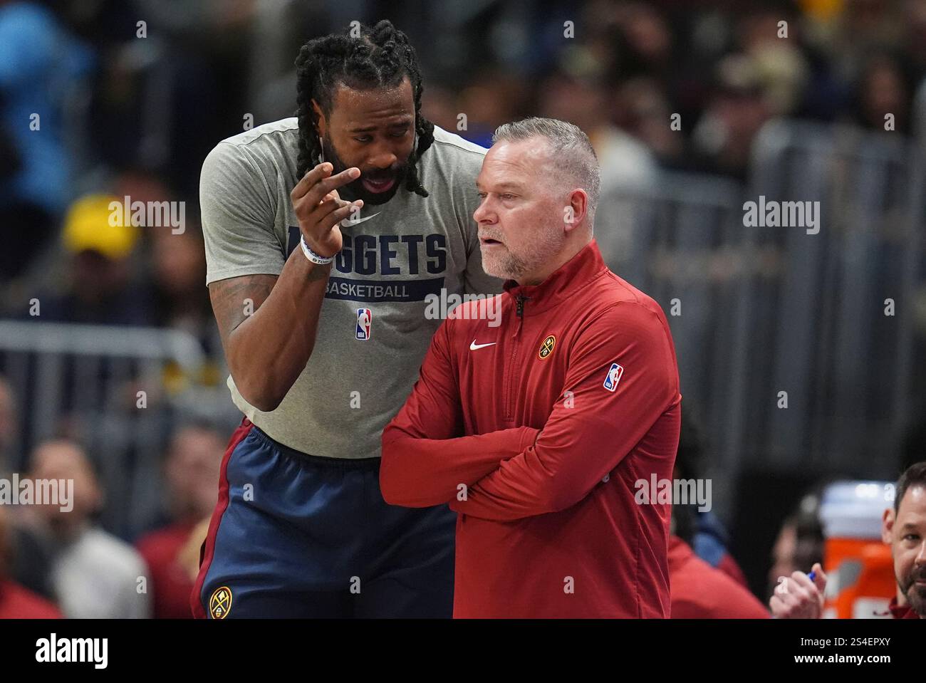 Denver Nuggets center DeAndre Jordan (6) confers with head coach ...