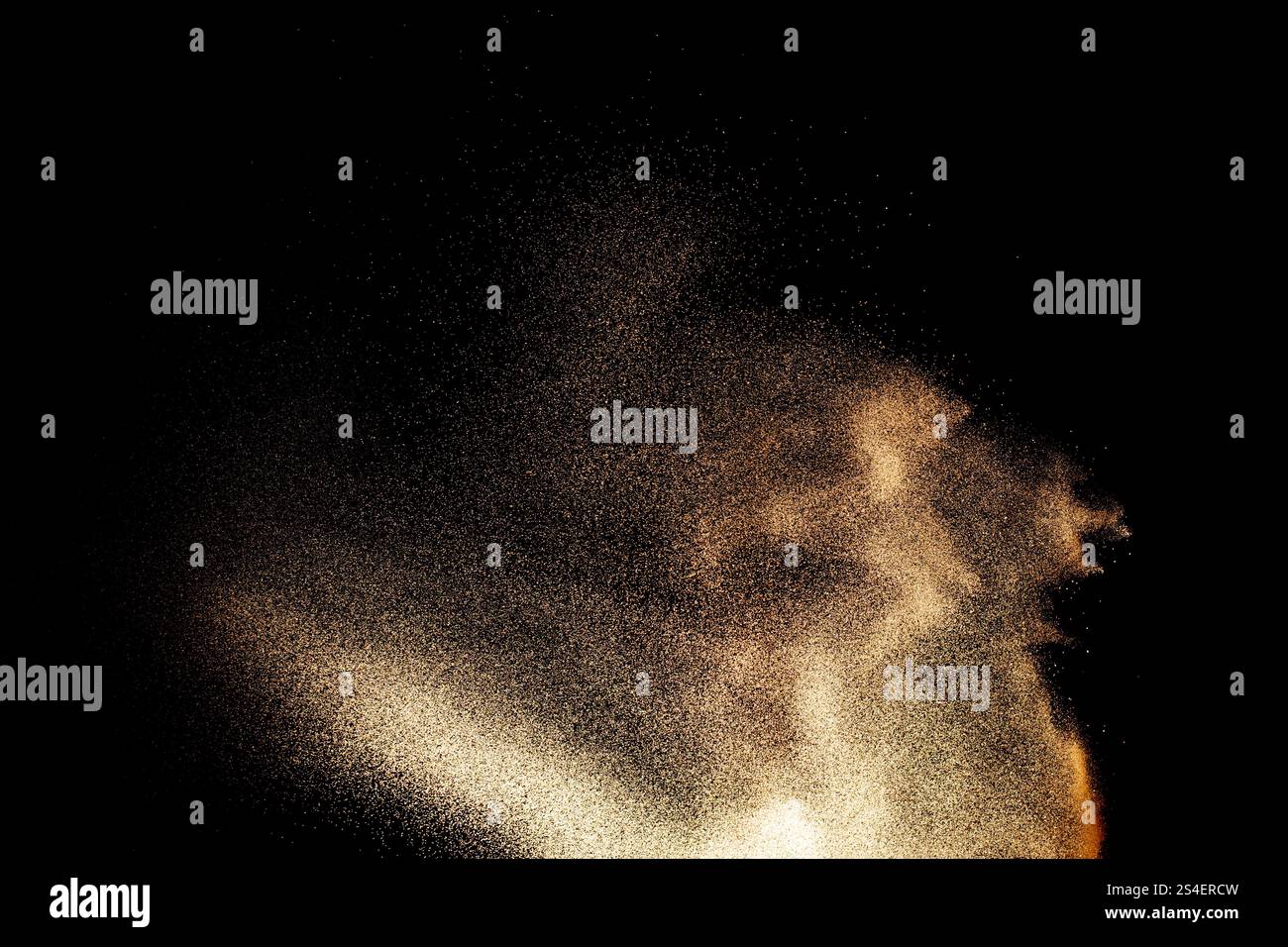 Sand flying explosion isolated on black background ,throwing freeze ...