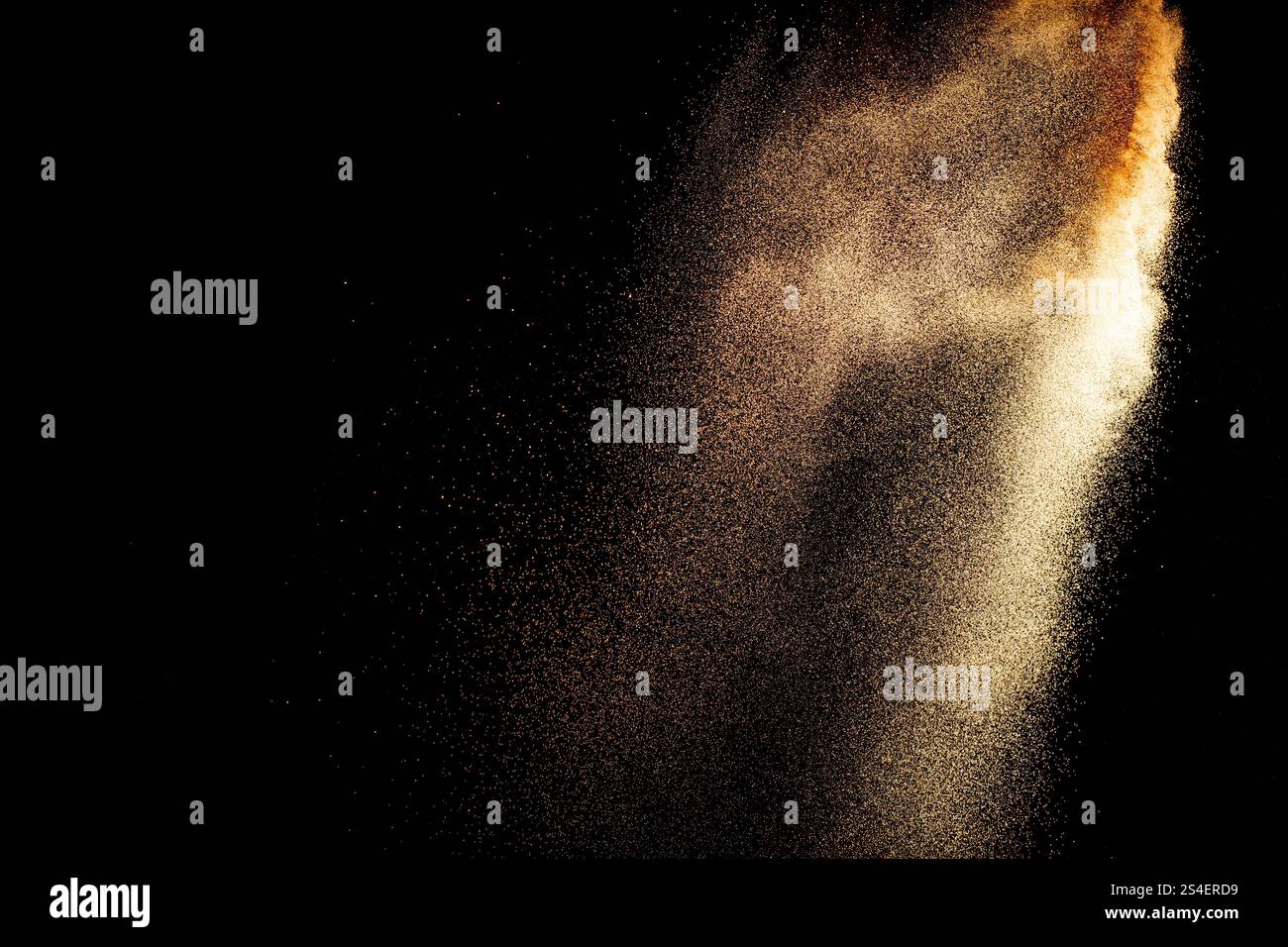 Sand flying explosion isolated on black background ,throwing freeze ...