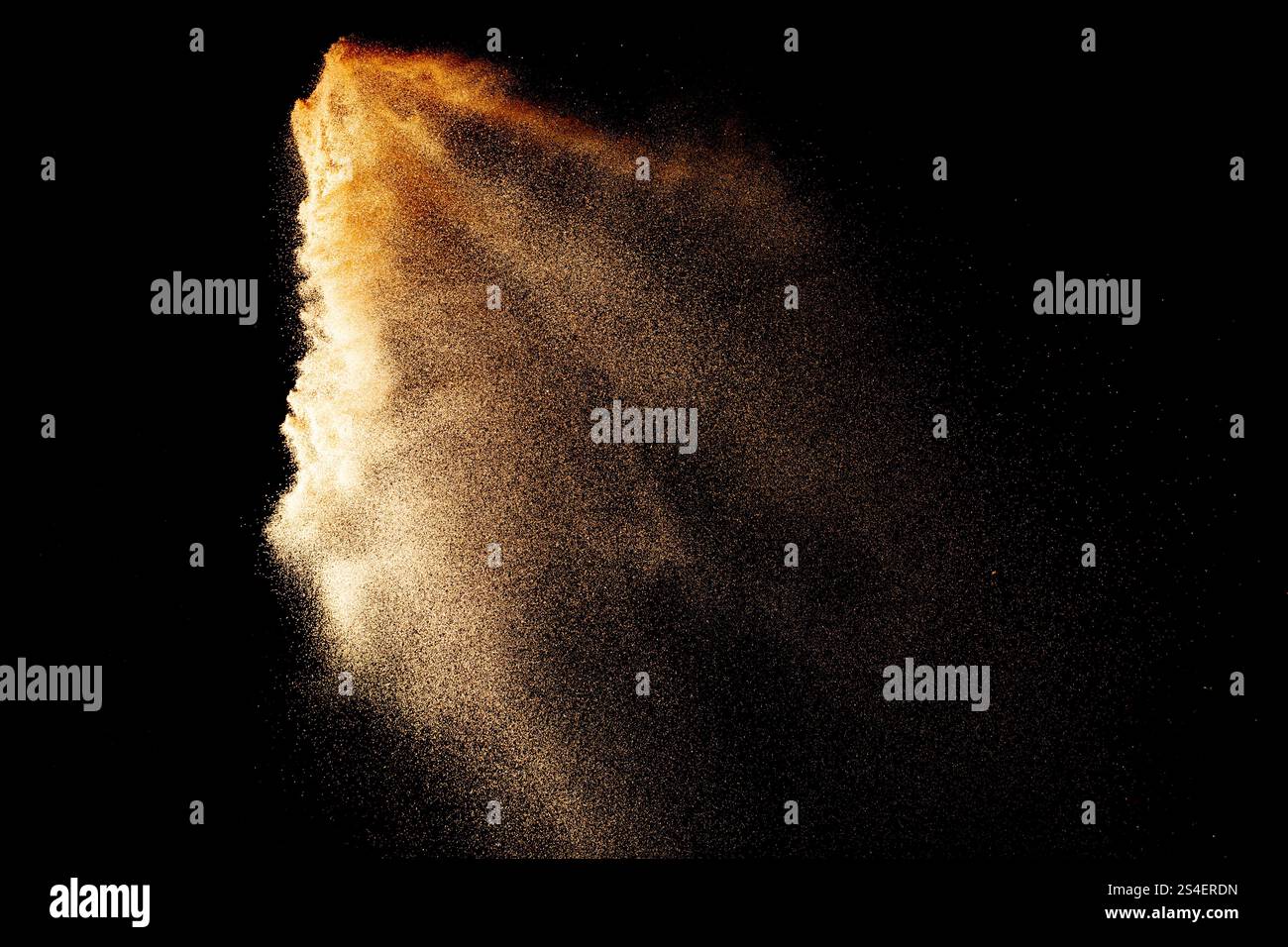 Sand flying explosion isolated on black background ,throwing freeze ...