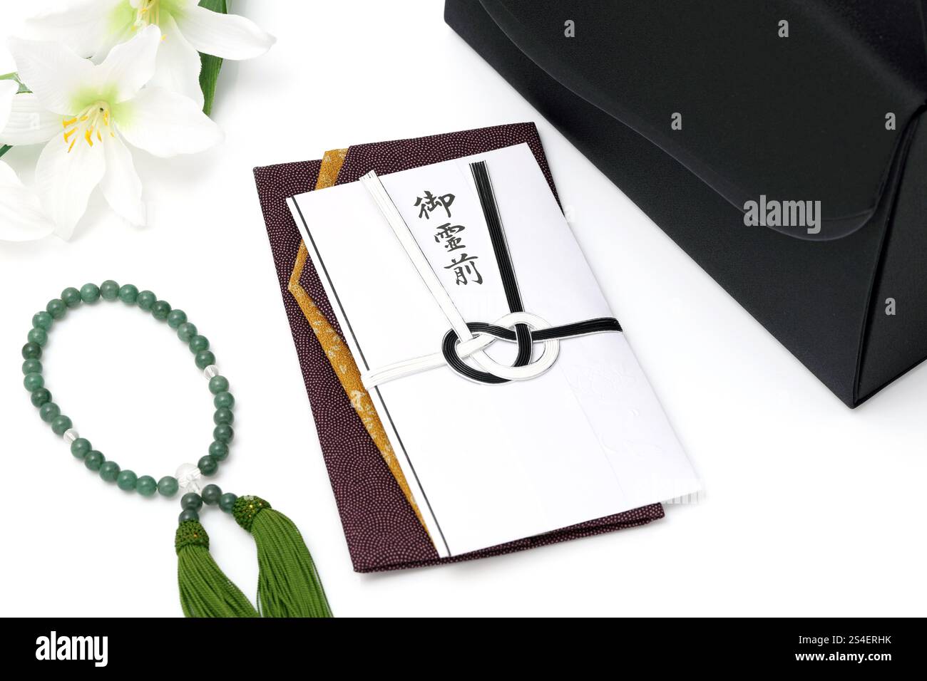 Japanese funeral putt money into offering envelope. Japanese word of ...