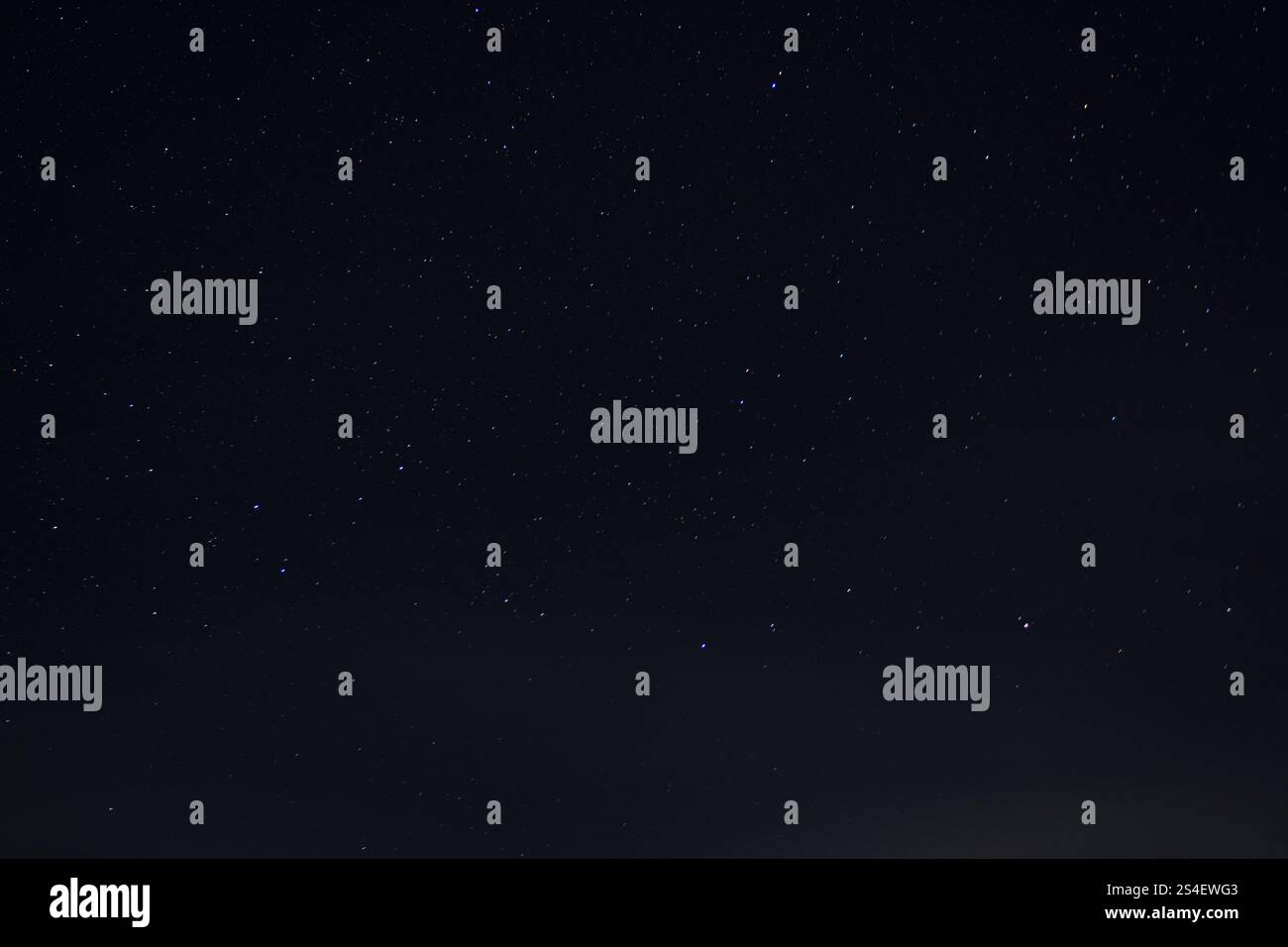 The night sky is a bit cloudy. Meteorites are falling. Stars and galaxy ...
