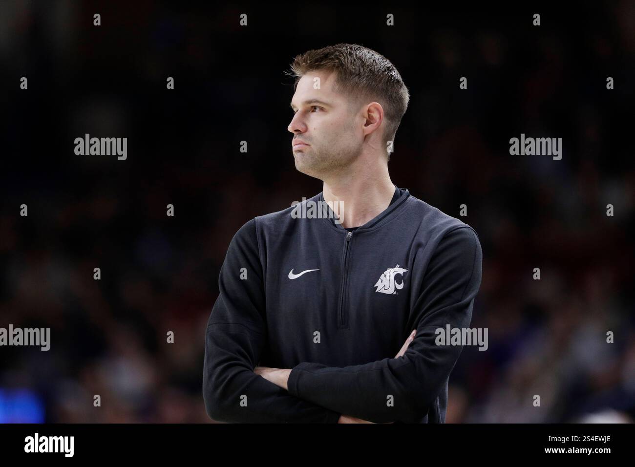 Washington State head coach David Riley watches the first half of an ...